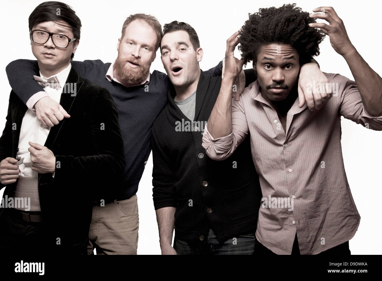 Portrait of four friends posing Stock Photo - Alamy