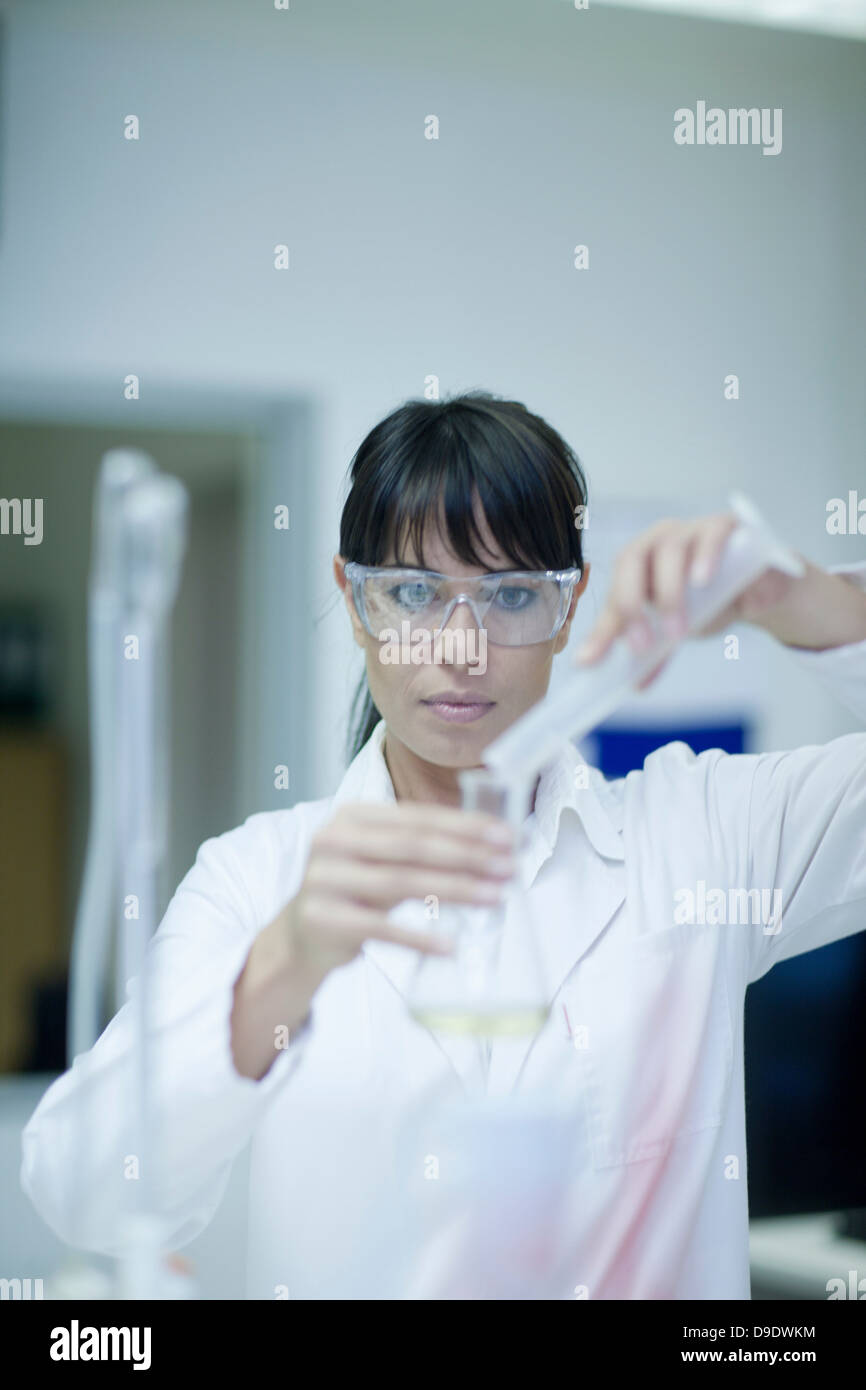 Mixing chemical sample research in hi-res stock photography and images ...