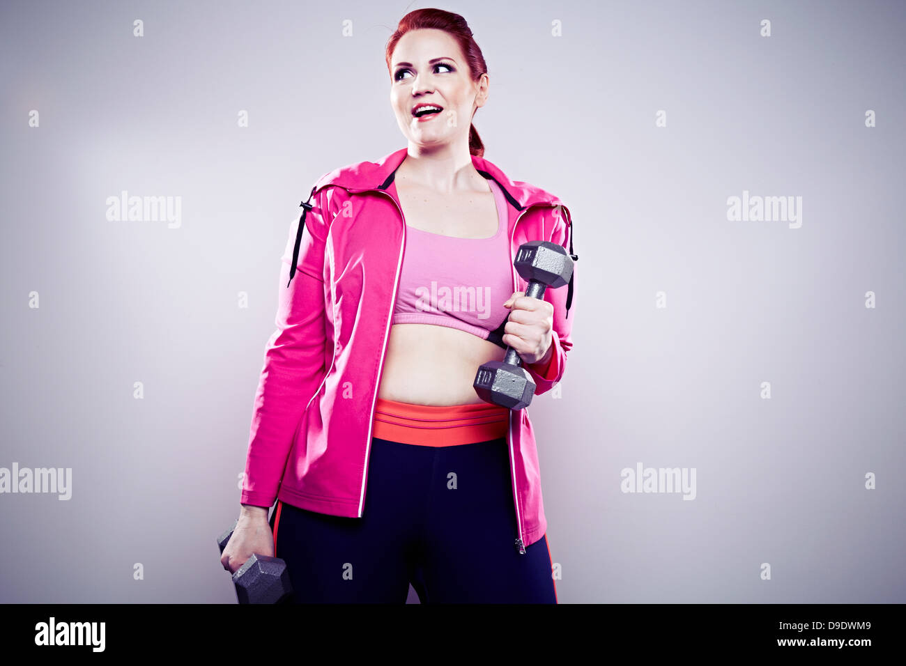 Hand woman young holding using hi-res stock photography and images - Alamy