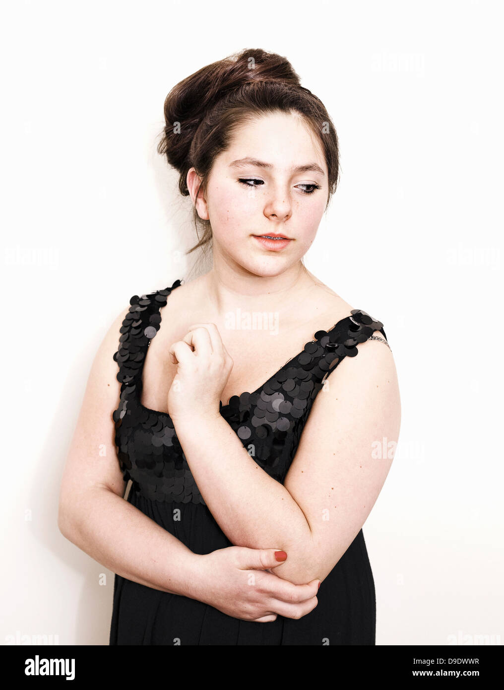 Teenage girl looking uncertain Stock Photo - Alamy