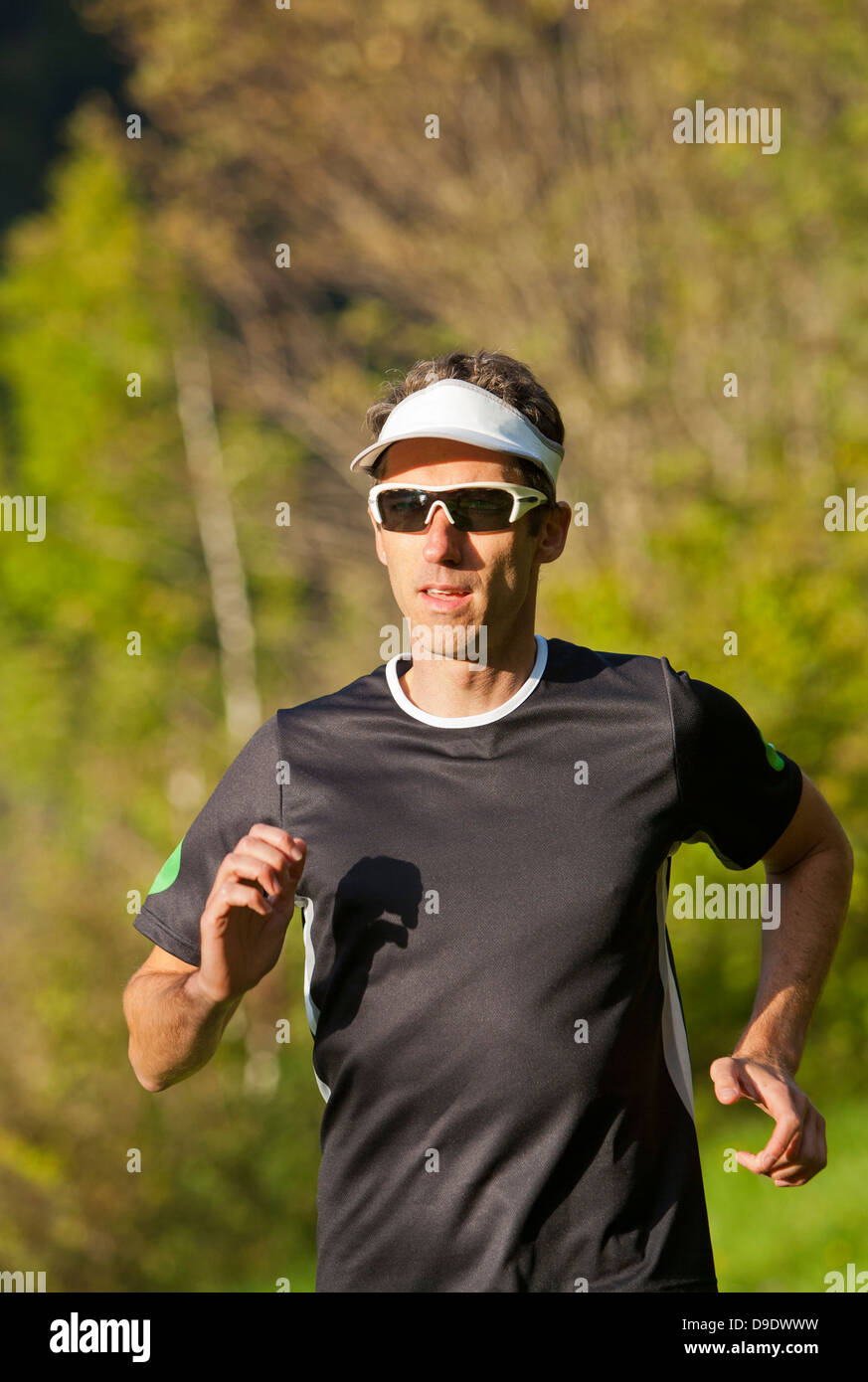 Male runner with excellent running technique Stock Photo - Alamy