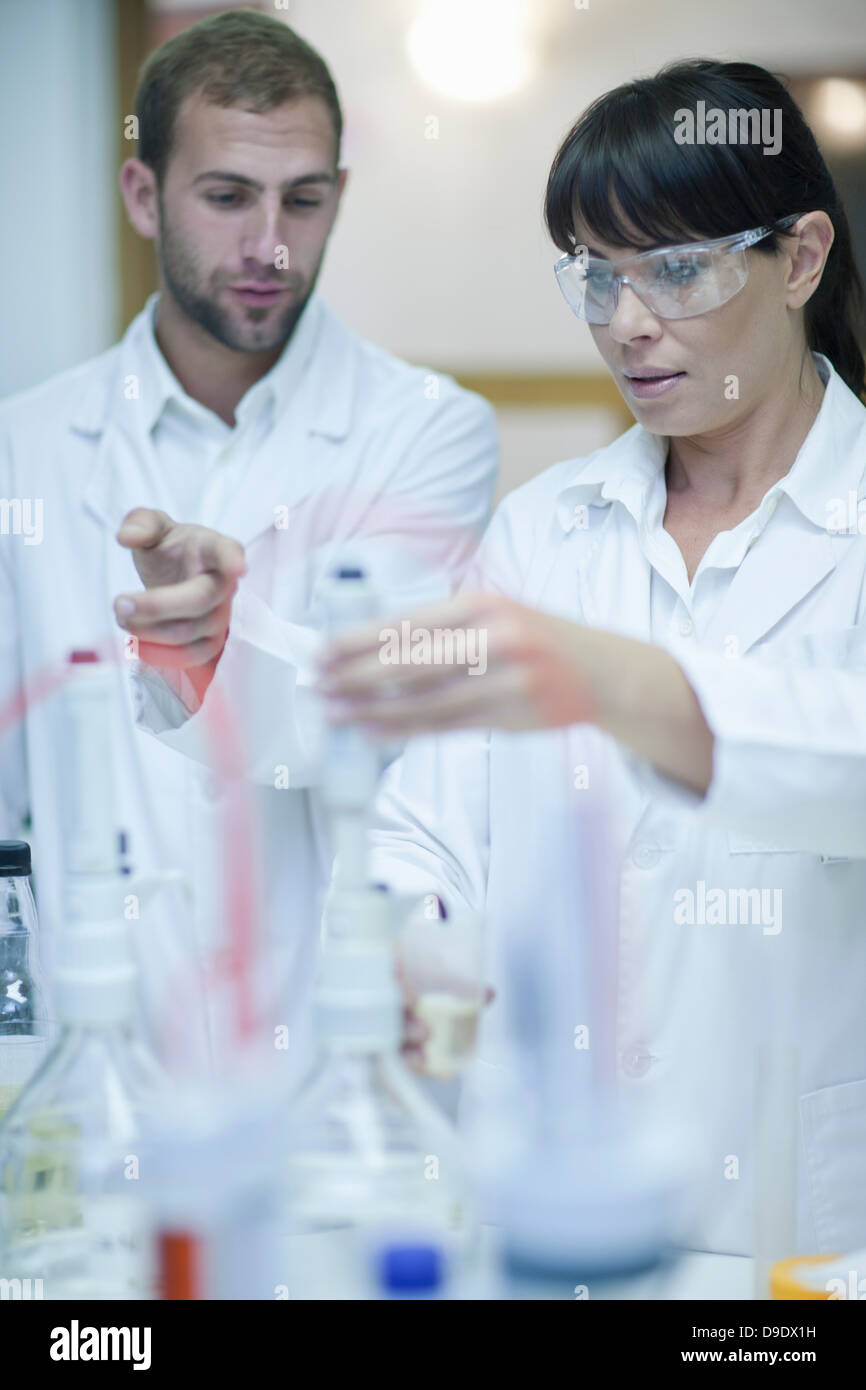 Oenologist monitoring sample testing in laboratory Stock Photo - Alamy