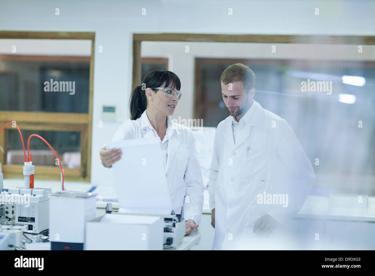 Oenologist monitoring sample testing in laboratory Stock Photo - Alamy