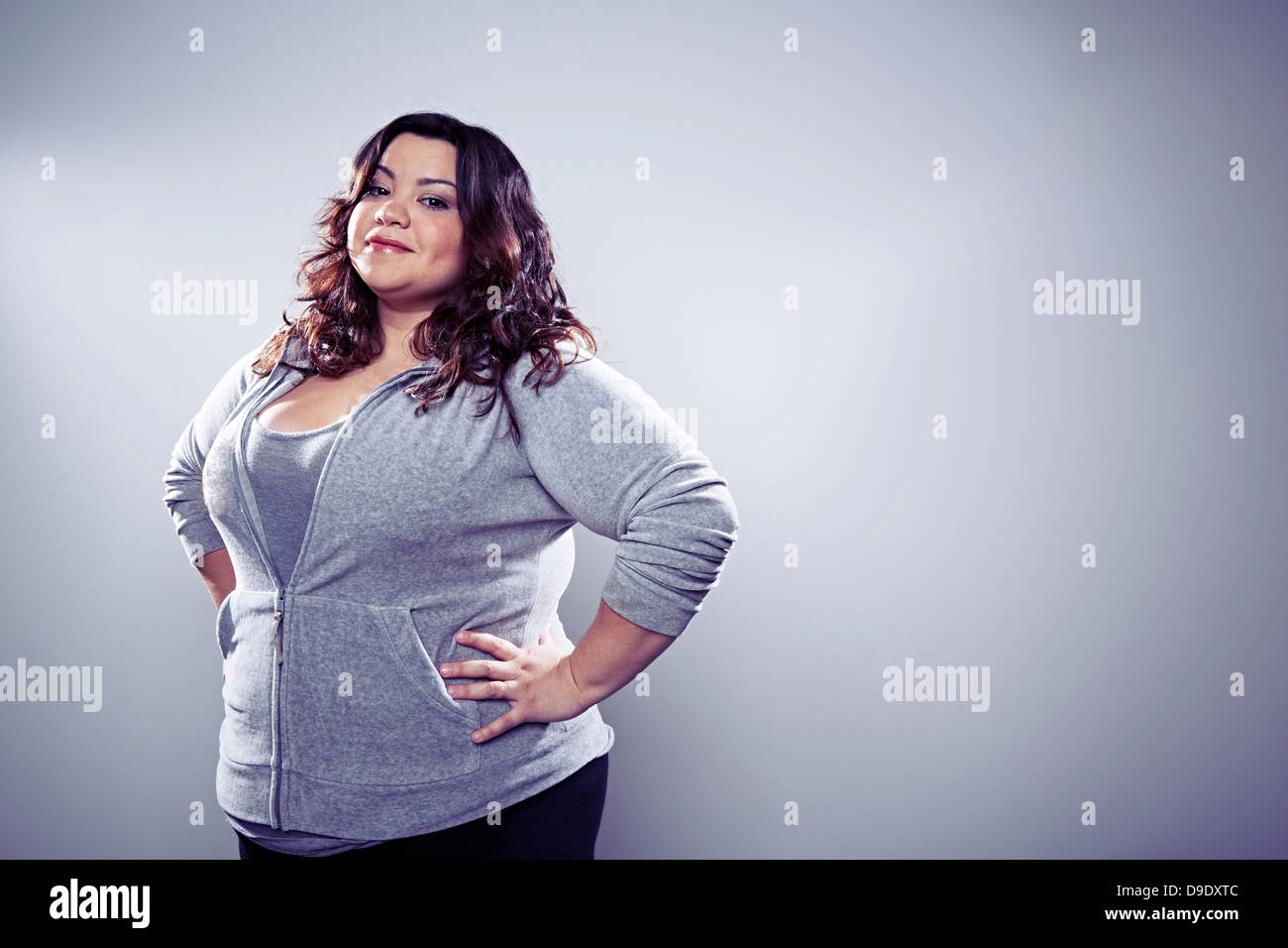 Overweight woman hands on hips hi-res stock photography and images - Alamy