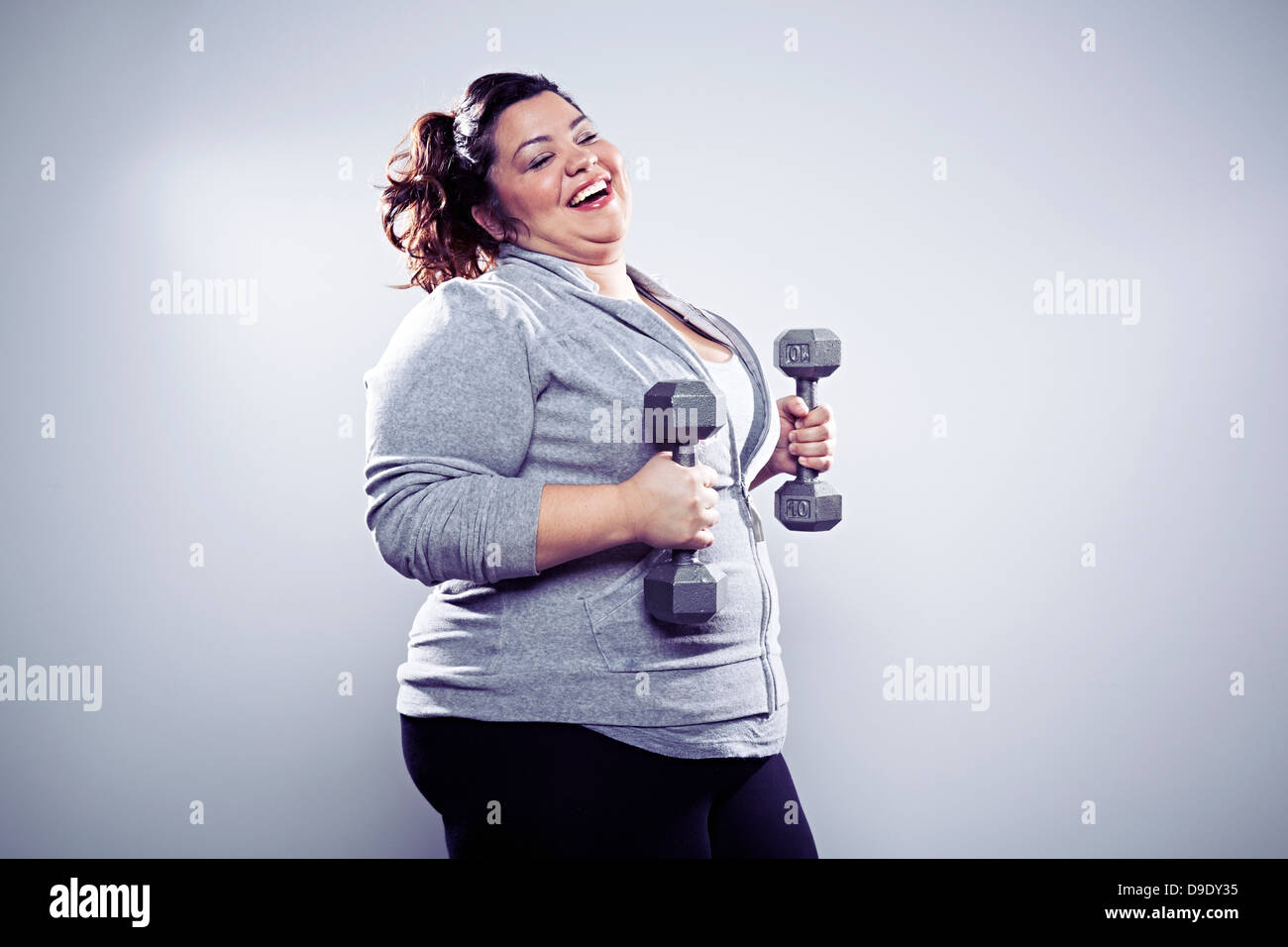 Gray hand weights hi-res stock photography and images - Alamy