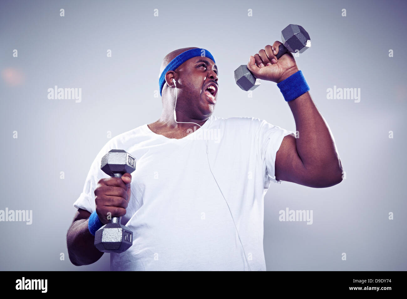 Using weights hi-res stock photography and images - Alamy
