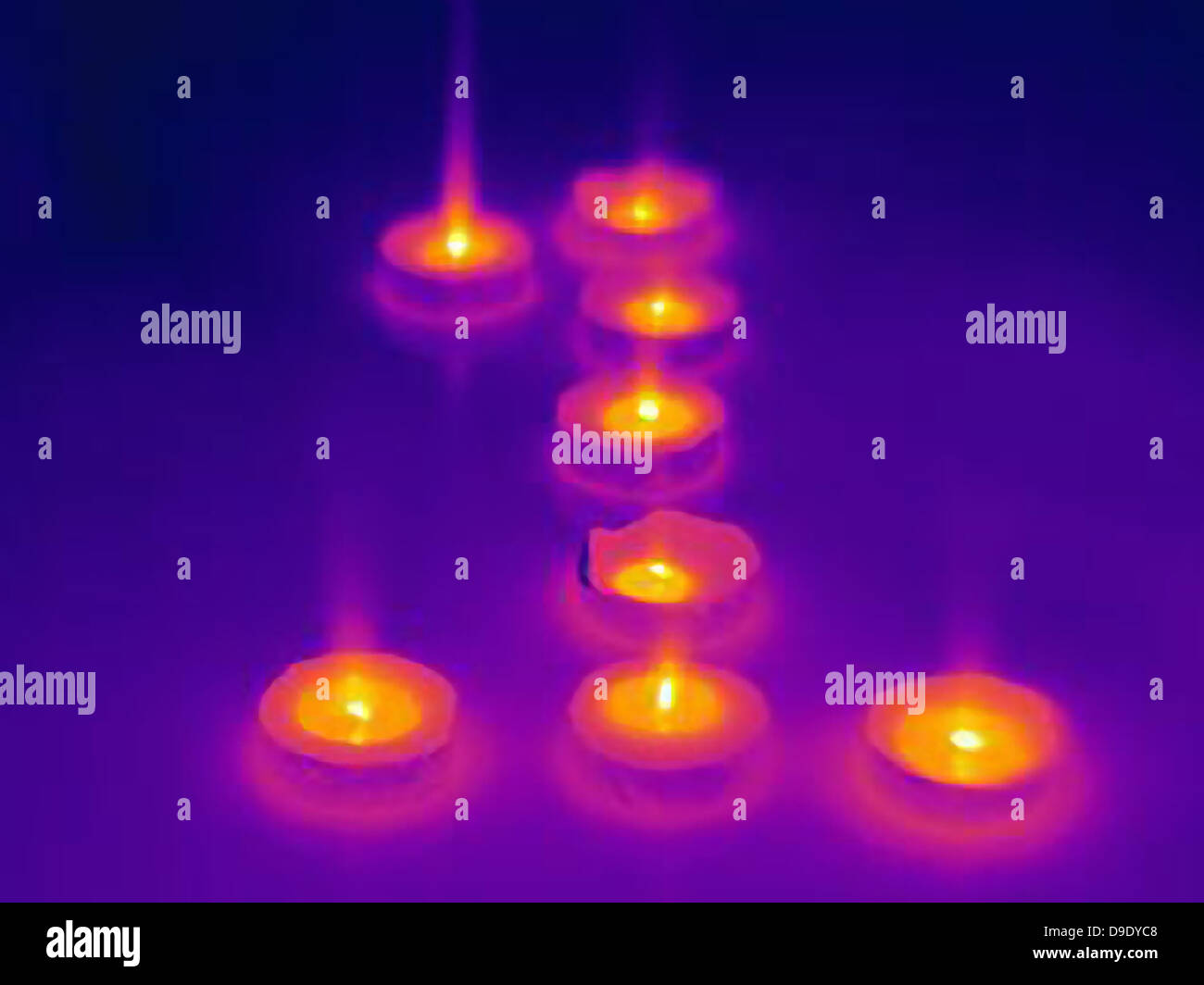 Thermal images of eight candles burning Stock Photo - Alamy