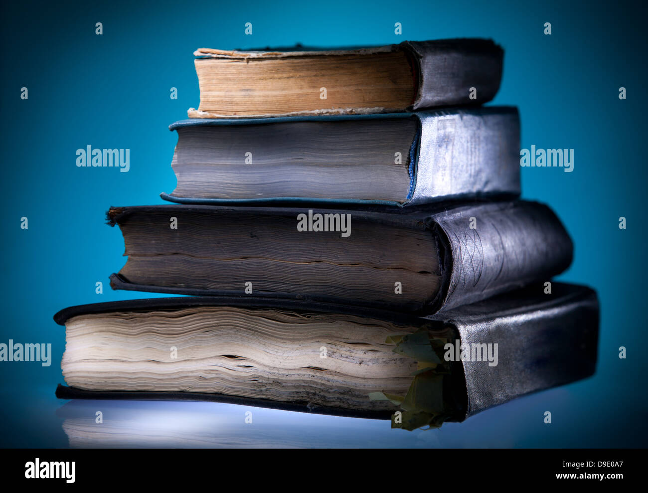 Old books, mystical blue light background Stock Photo - Alamy