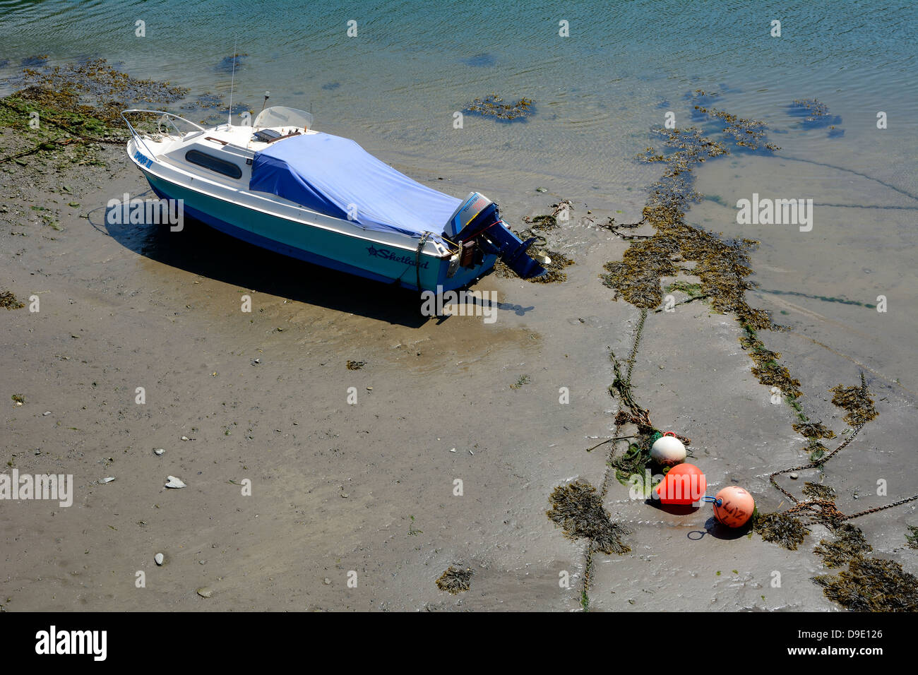 SMALL HOLIDAY CRUISER BEACHED IN WALES Stock Photo - Alamy