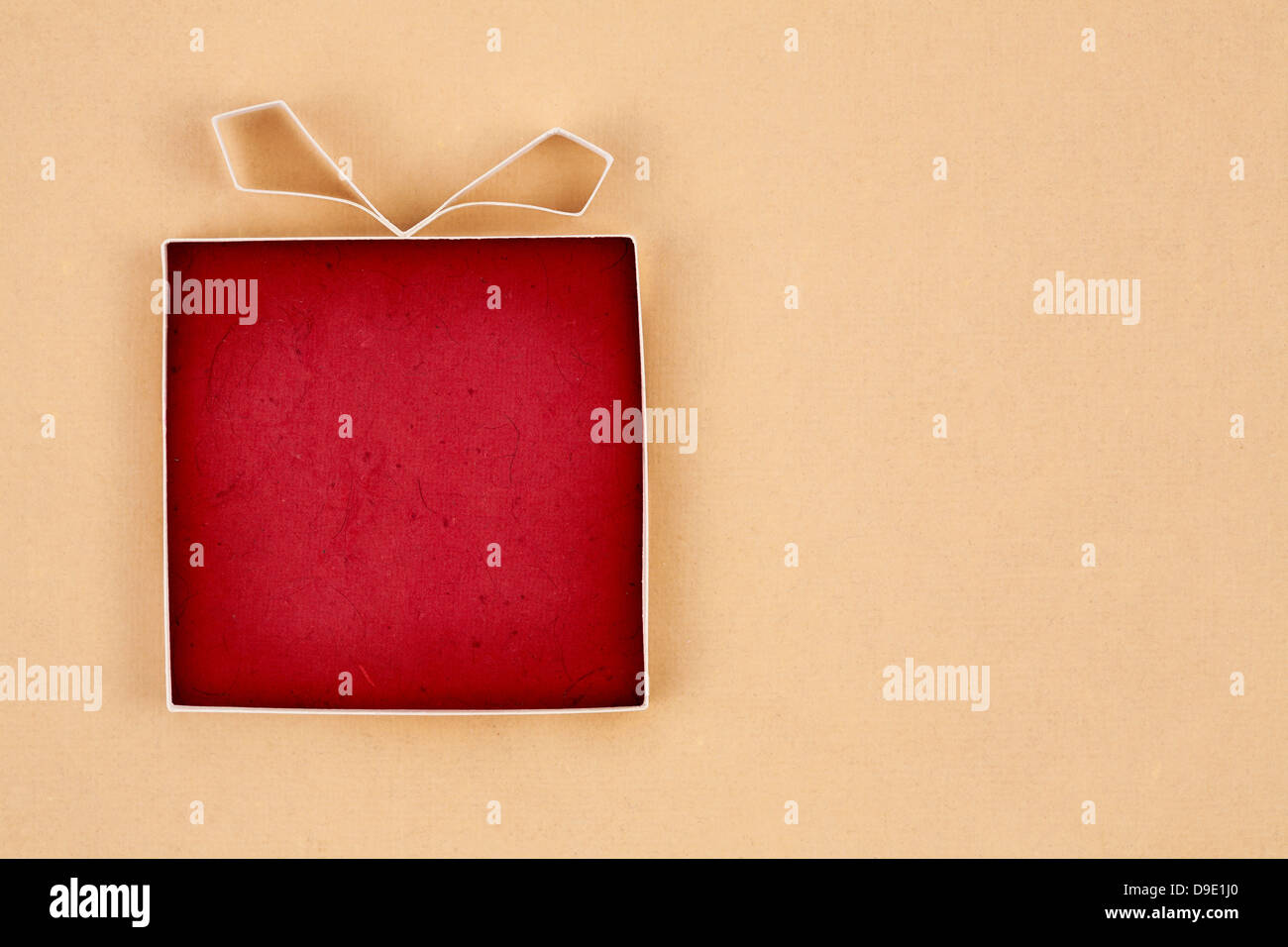 Hand made empty gift box, textured paper as background. Free space for ...