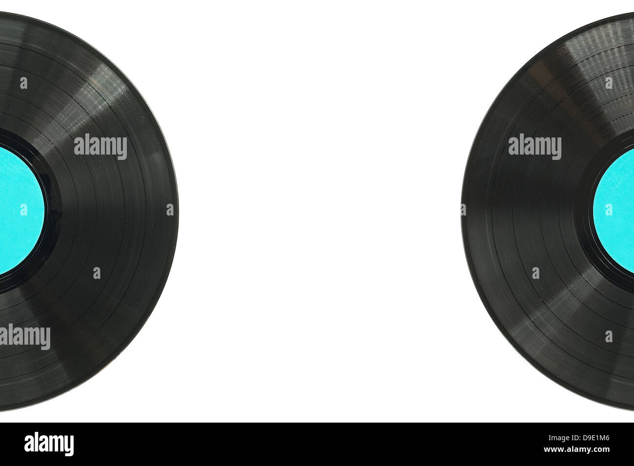 Two halves of a vinyl record on a white background Stock Photo - Alamy