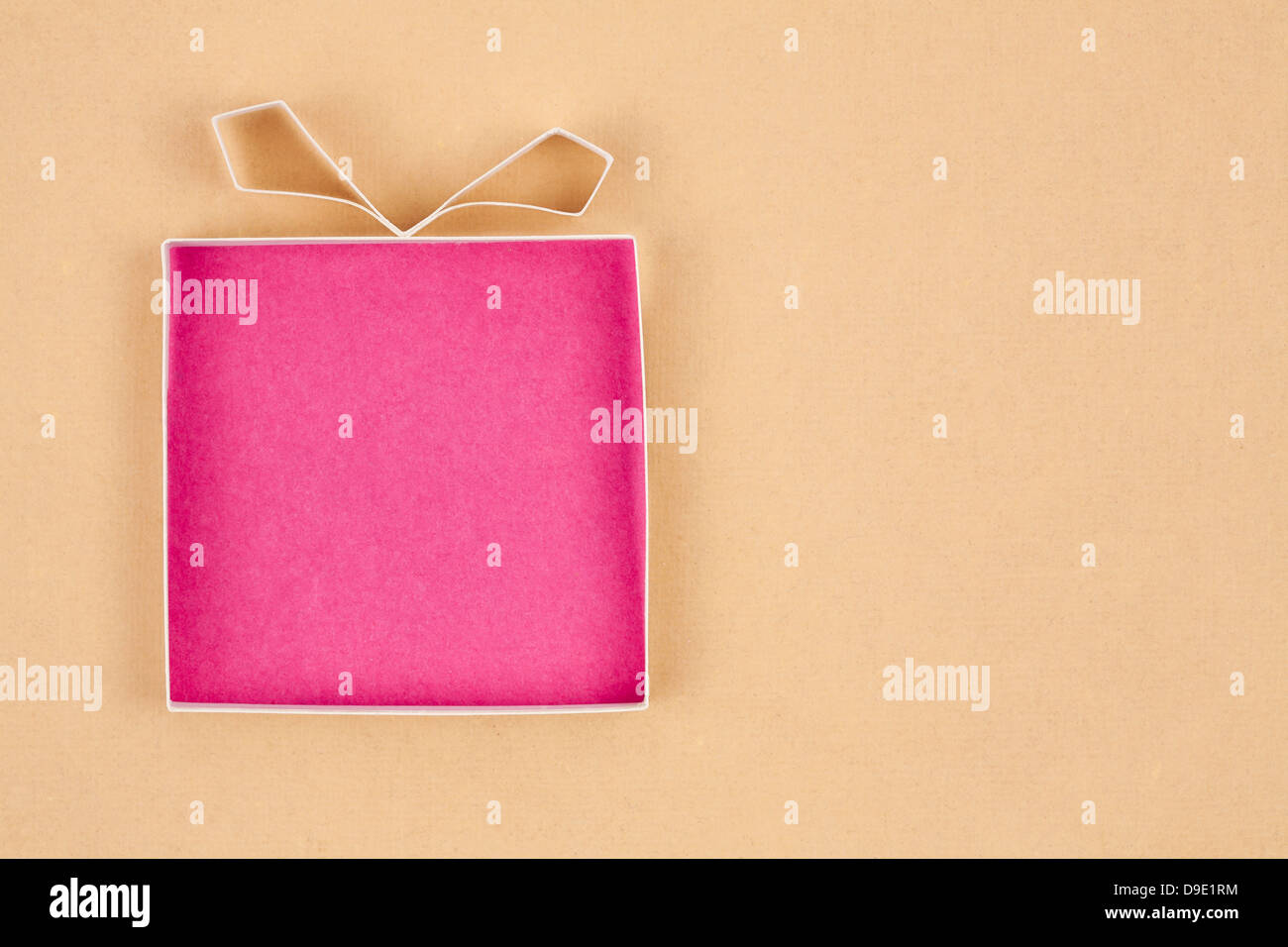 Hand made empty gift box, textured paper as background. Free space for ...