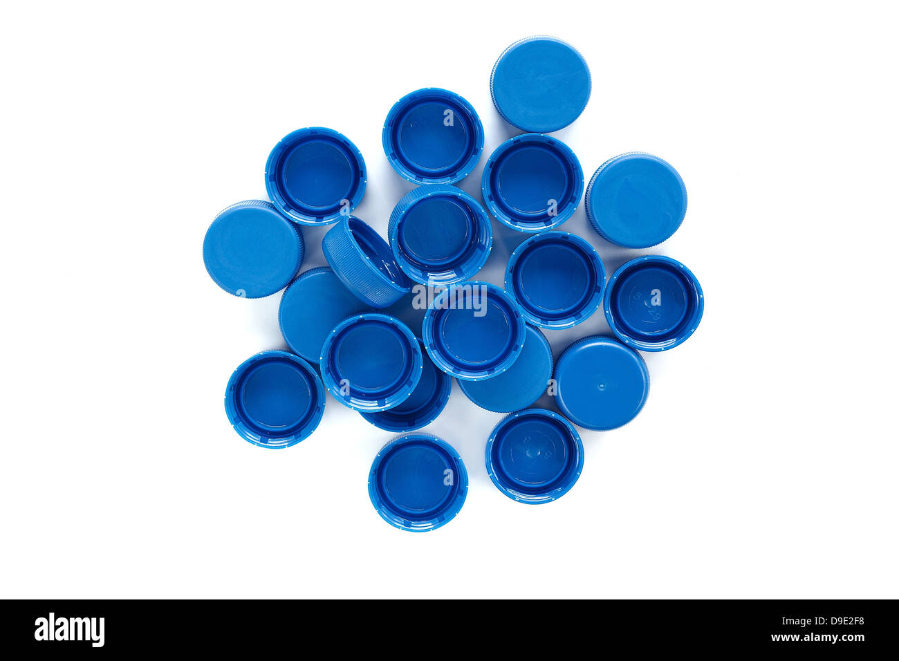 Blue plastic caps from bottles Stock Photo - Alamy