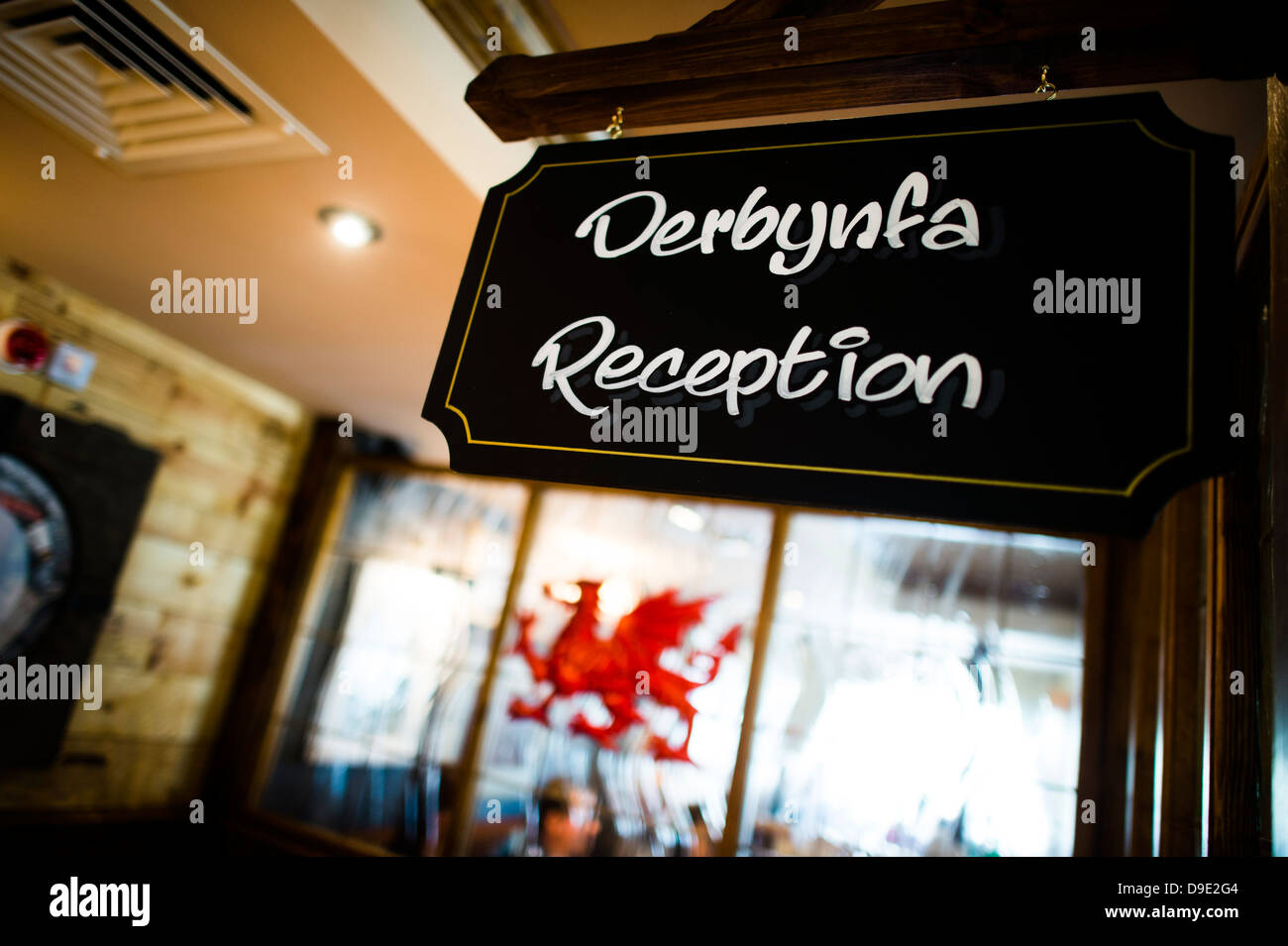 A bilingual welsh and english sign and a red dragon motif at a hotel ...