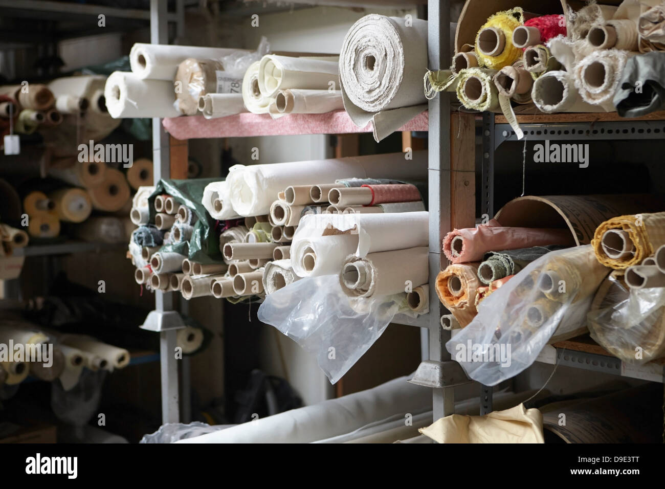 Rolls of fabric in textiles factory Stock Photo - Alamy