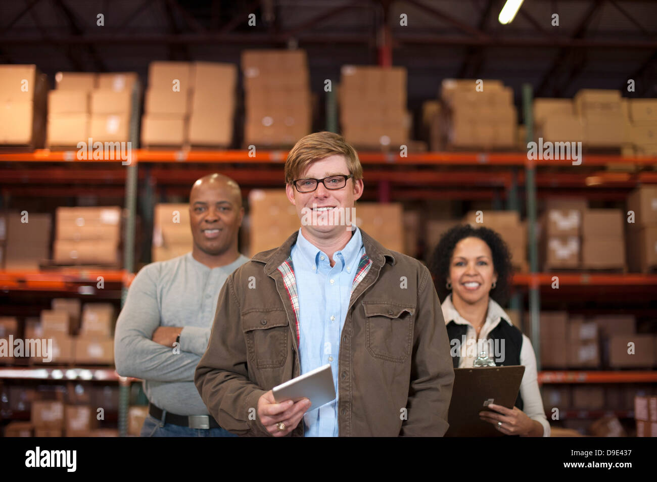Portrait of warehouse workers Stock Photo - Alamy