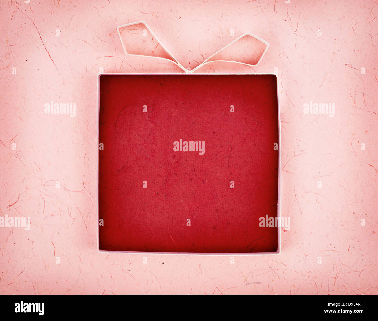 Hand made empty gift box, textured paper as background. Free space for ...