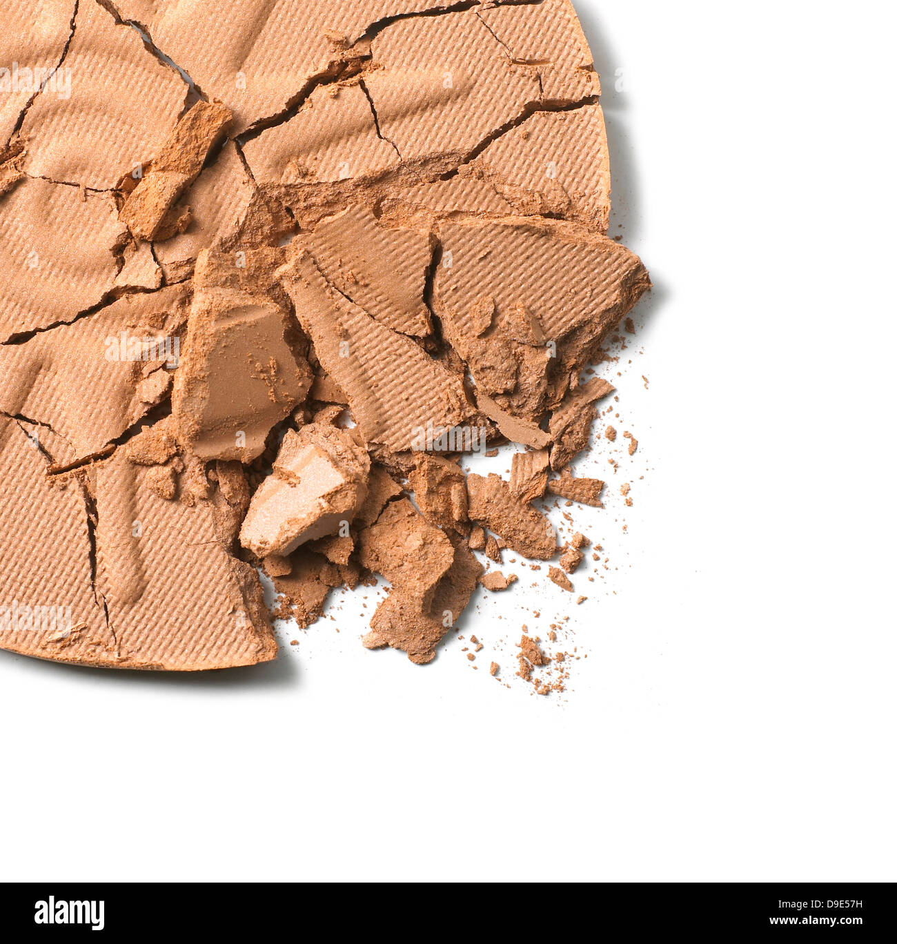 crumbled bronzer powder compact cut out onto a white background Stock ...