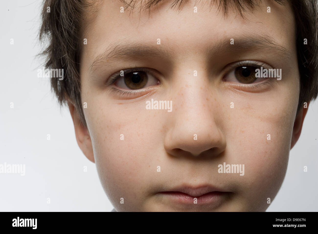 Close up of a young boy, confident looking into the camera come Stock ...