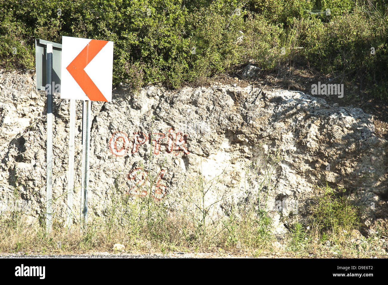Road sign with arrow Stock Photo - Alamy