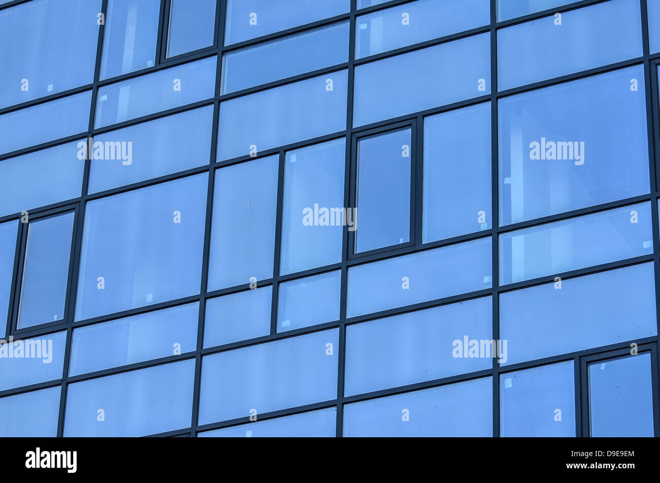 Building with glass windows Stock Photo - Alamy