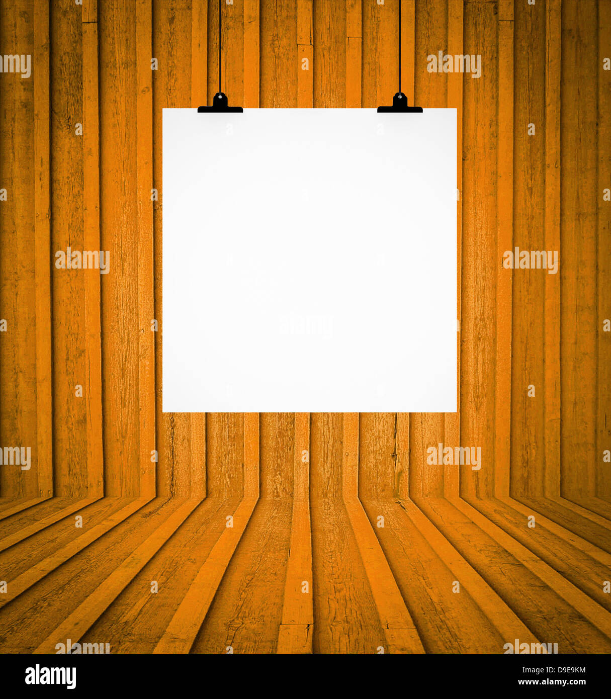 Blank board hanging at wall in orange retro room Stock Photo - Alamy