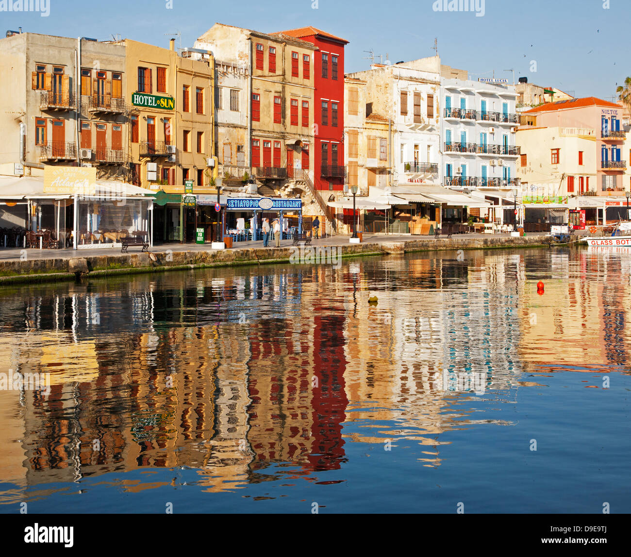 Hotels and restaurants in picturesque old town Chania reflected in the ...