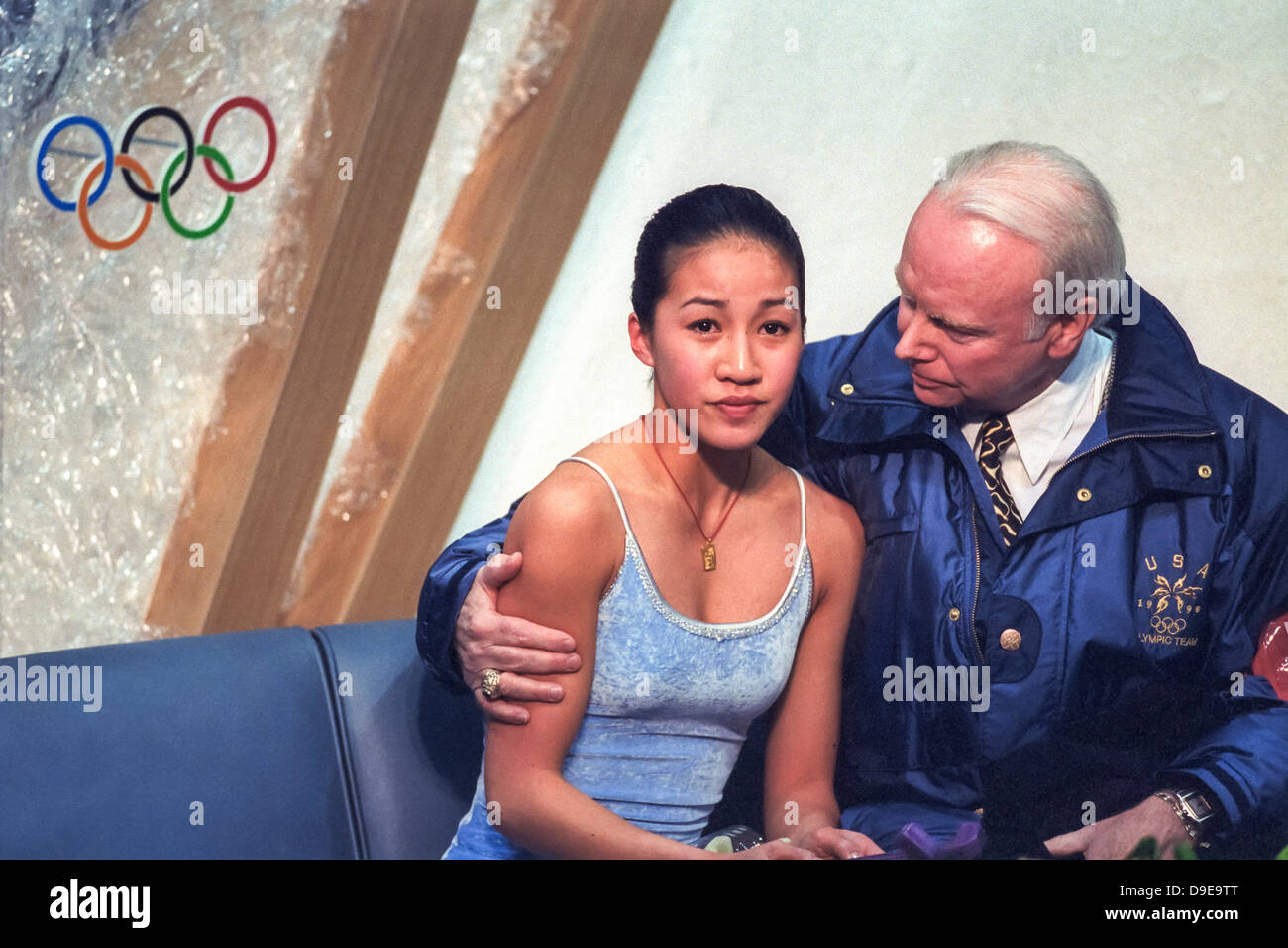 Michelle Kwan (USA) in the kiss and cry with coach Frank Carroll ...