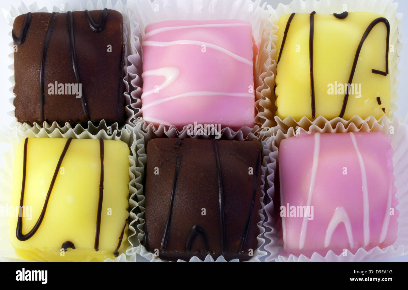 Frosted decorated fondant fancies individual cakes hi-res stock ...