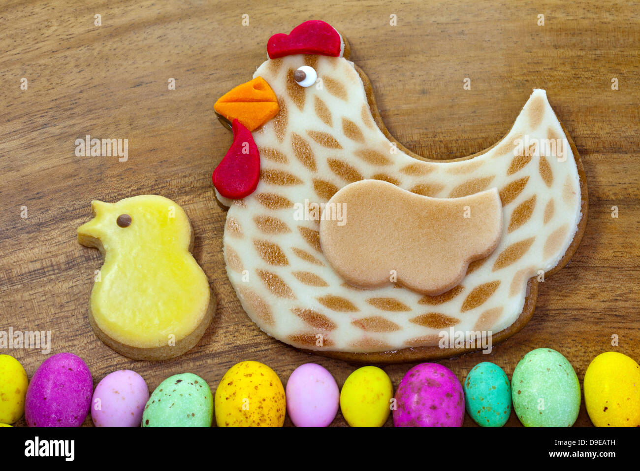 Traditional Easter hen and small chick biscuits on a border of ...