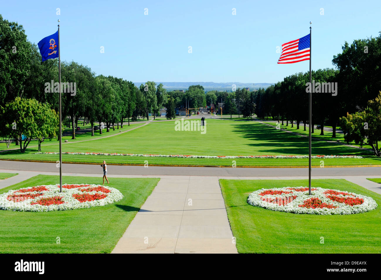 North Dakota State Capitol Bismarck ND flags Stock Photo - Alamy