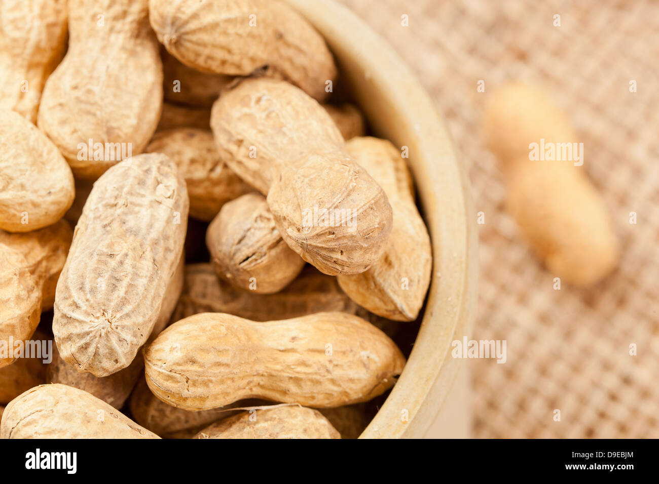 Fresh Dry Organic Peanuts against a background Stock Photo - Alamy