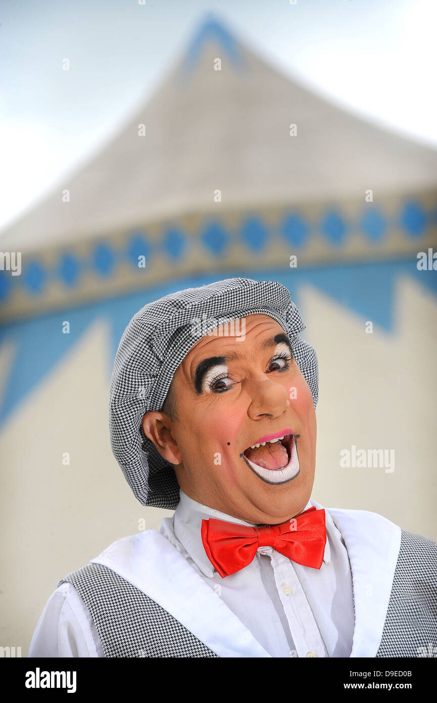 Circus clown outside big top tent Stock Photo - Alamy