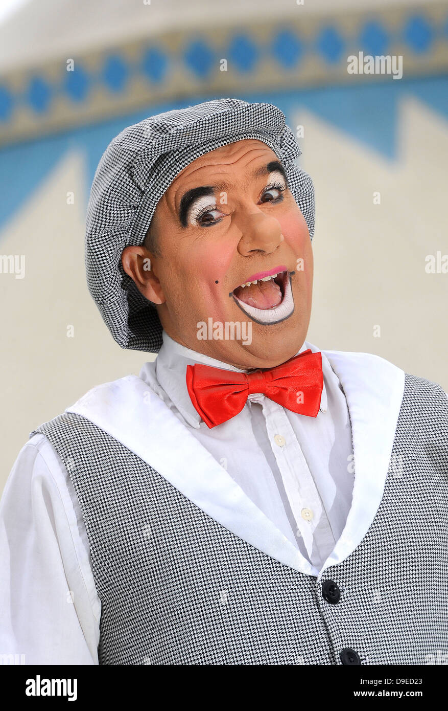 Circus clown outside big top tent Stock Photo - Alamy