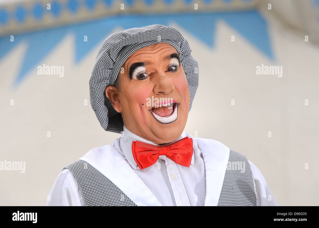 Circus clown outside big top tent Stock Photo - Alamy