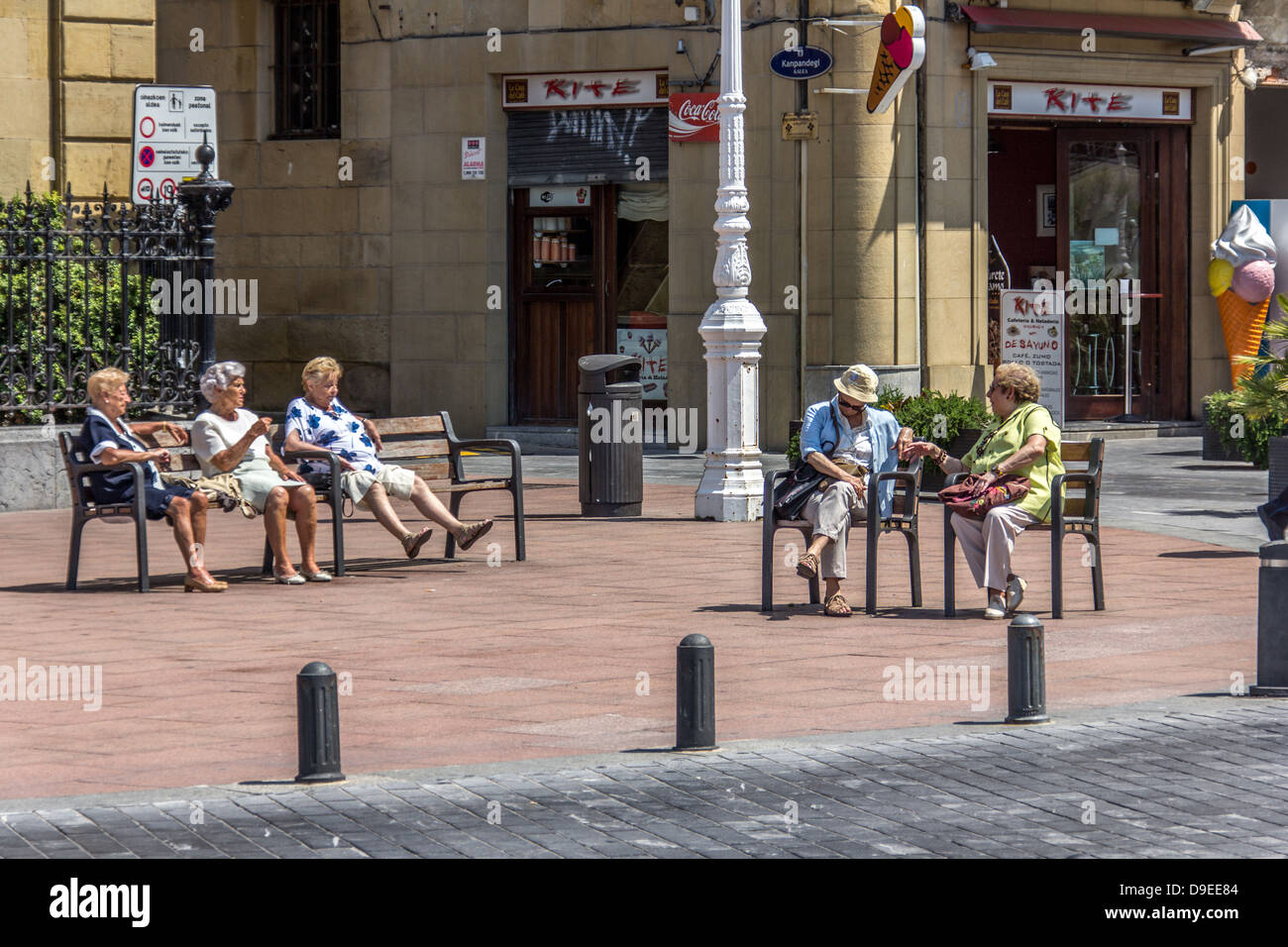 Adult females relaxing in the sunshine in san sebastian spain hi-res ...