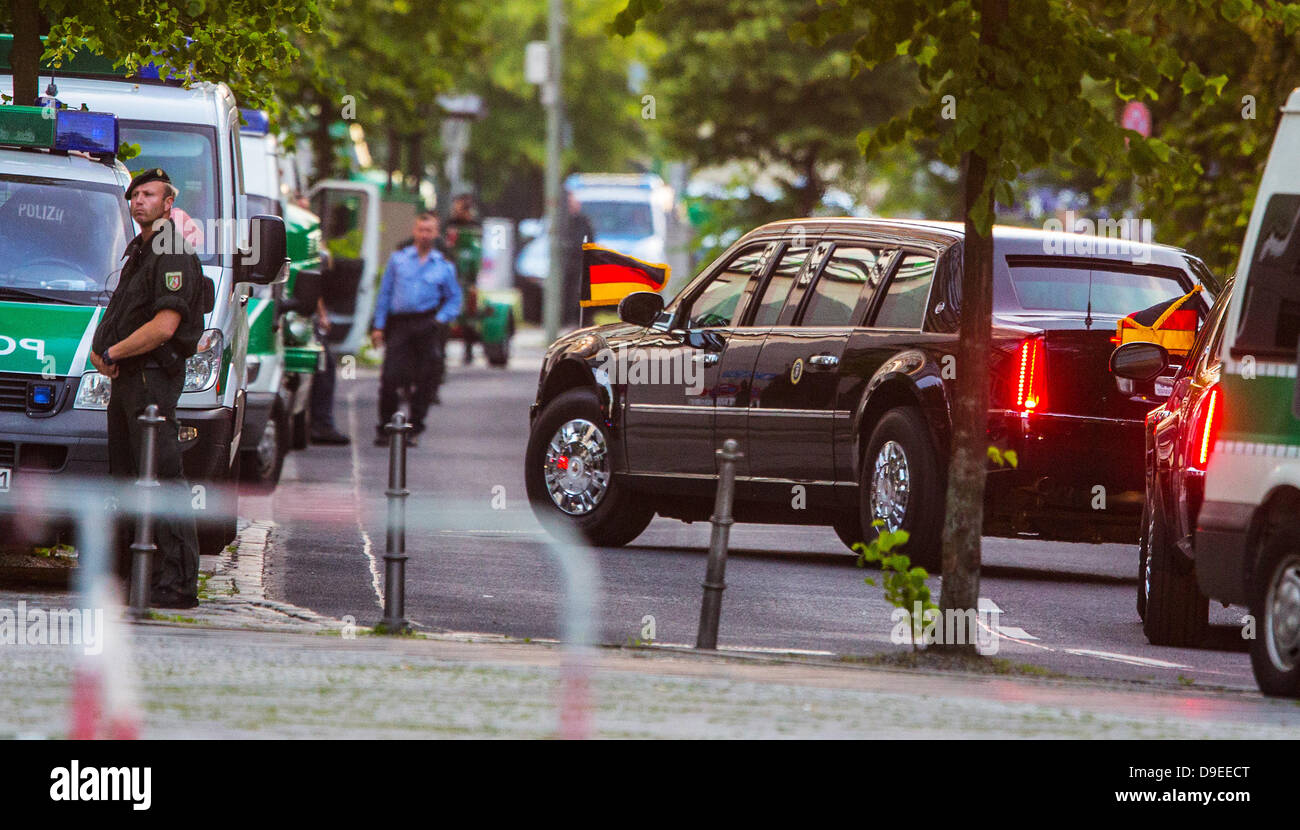 US Presidents Barack Obama's motorcade passes a German police car as it ...