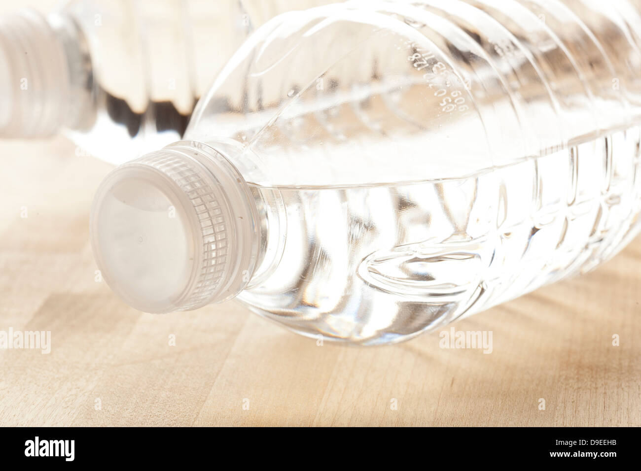 Refreshing water in a bottle against a background Stock Photo - Alamy