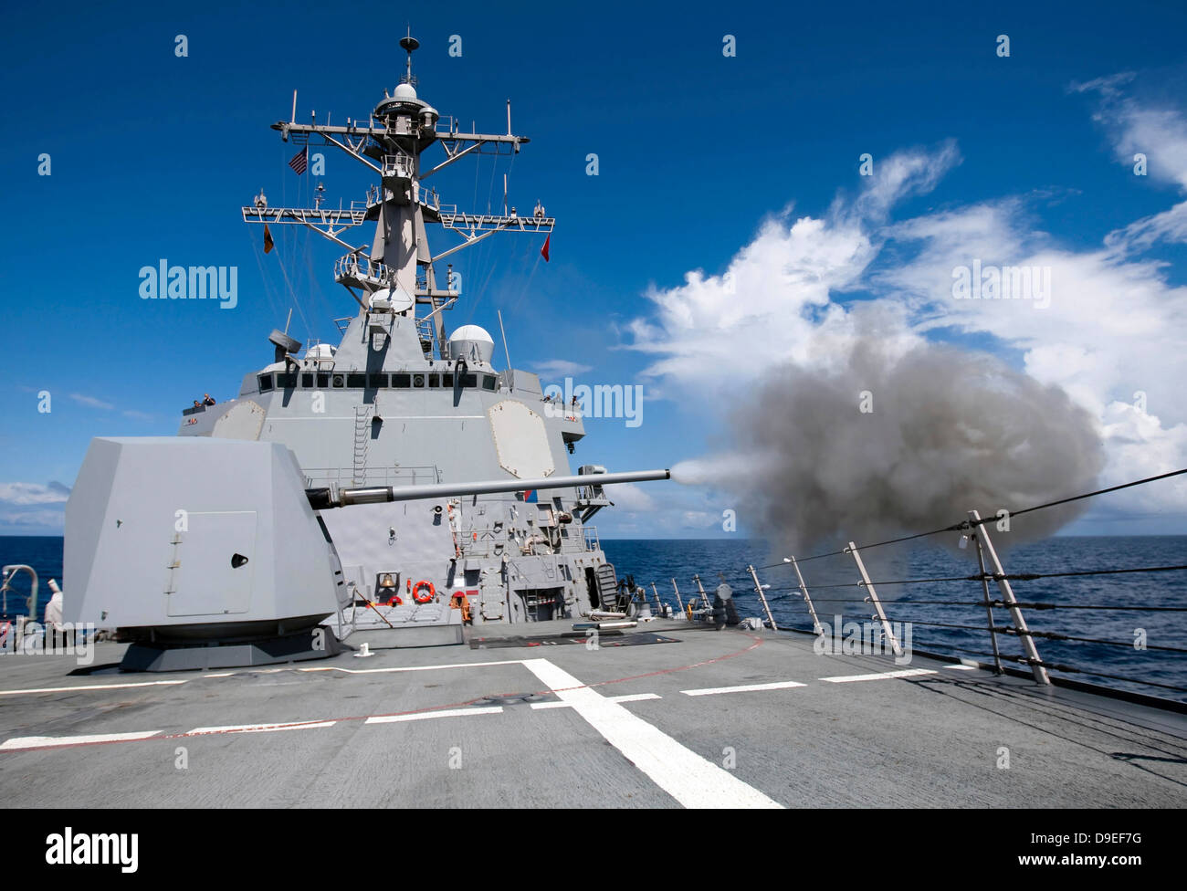 Guided-missile destroyer USS Pinckney fires its MK-45 5-inch/54-caliber ...