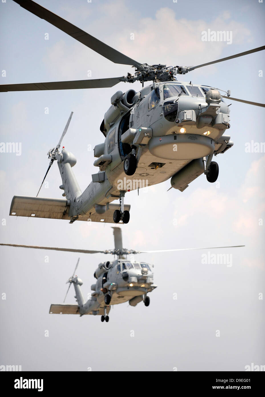 Two multi-mission MH-60R Sea Hawk helicopters fly in tandem Stock Photo ...