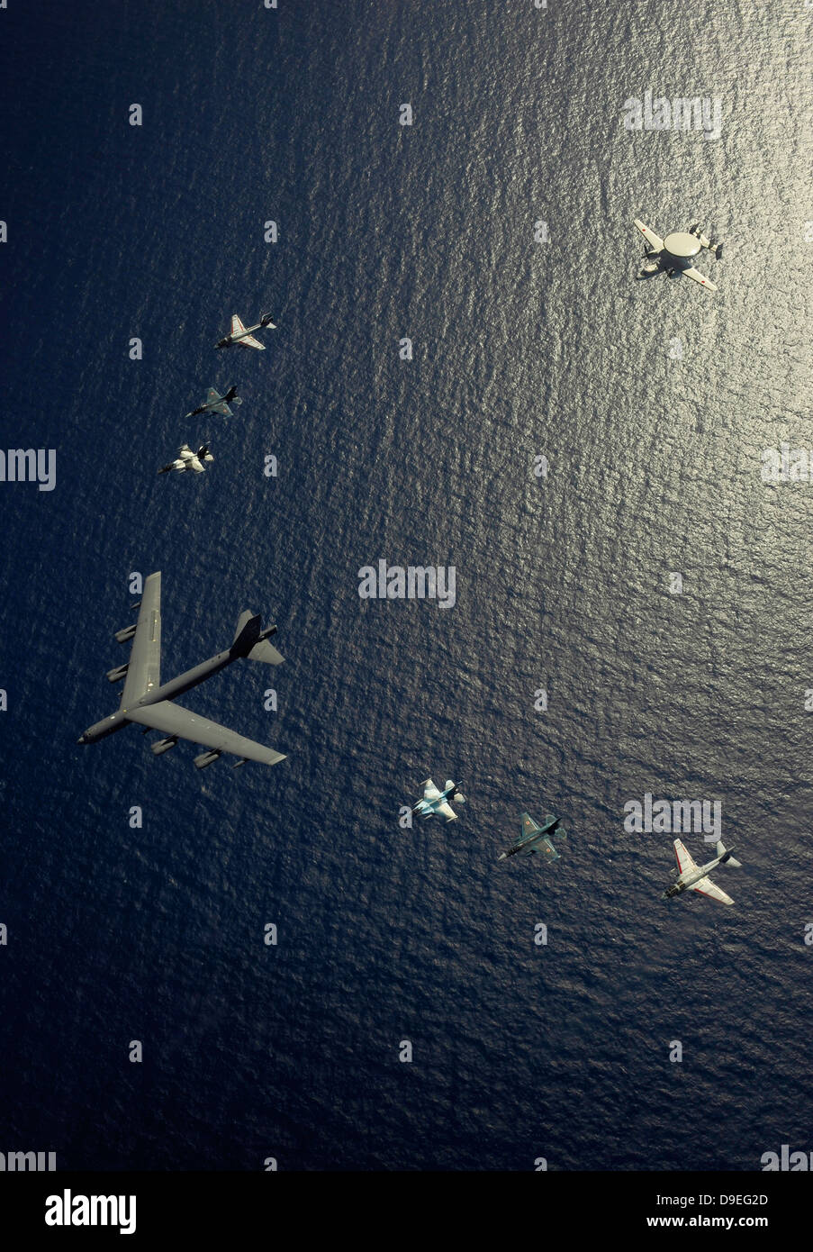 A U.S. Air Force B-52 Stratofortress aircraft leads a formation of ...