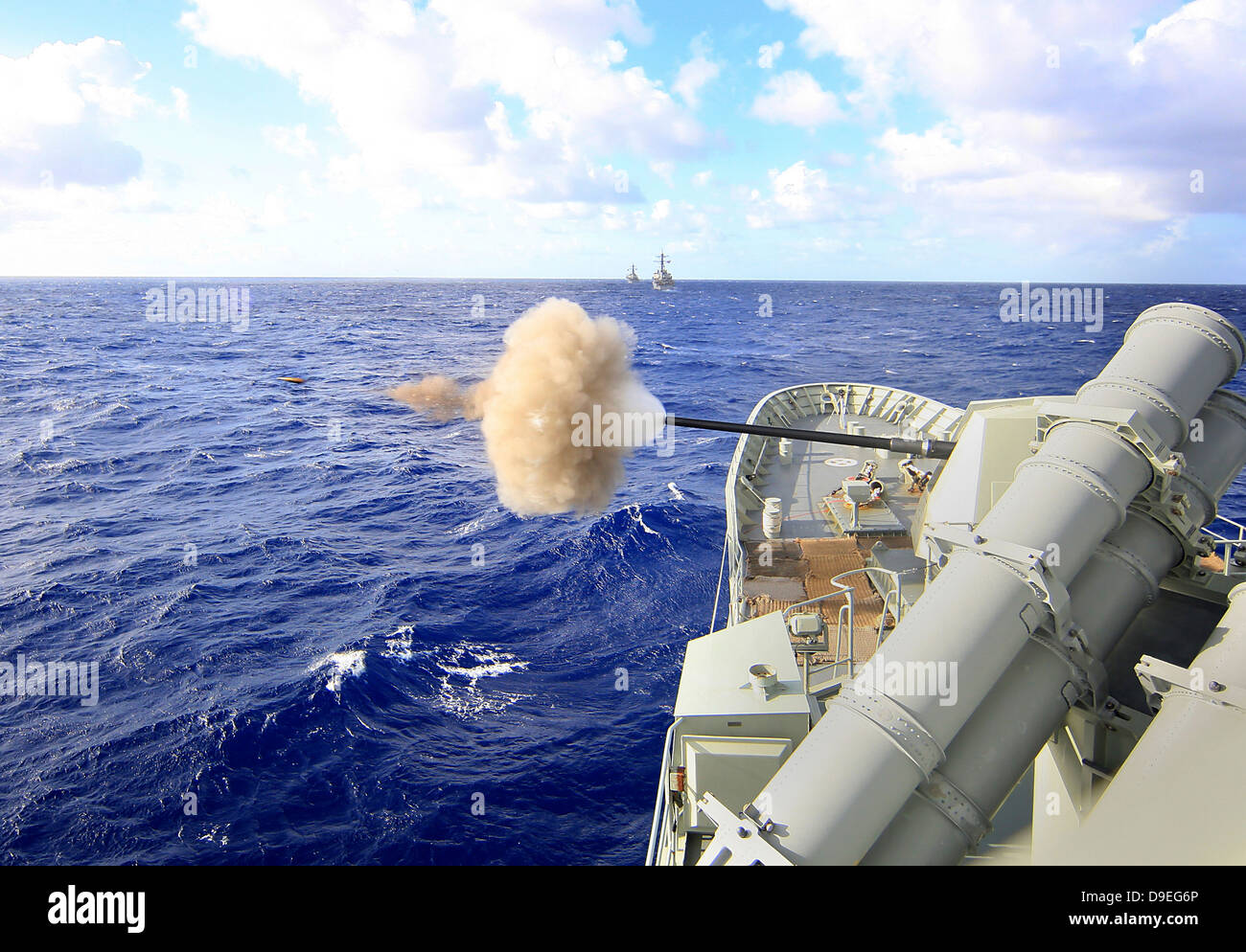 The Australian navy frigate HMAS Warramunga fires its 5-inch gun during ...