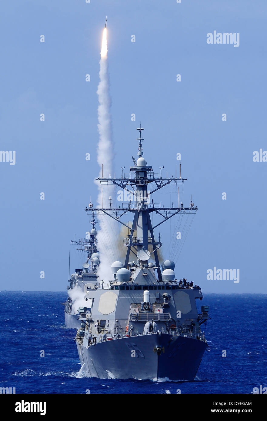 The guided-missile destroyer USS Benfold fires a surface-to-air missile ...