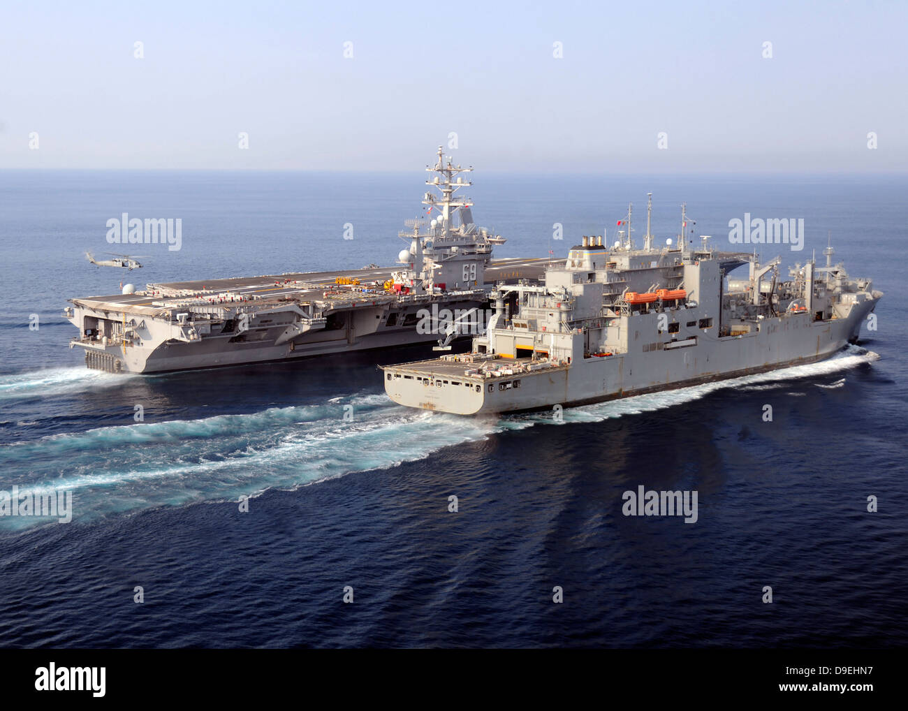 The Military Sealift Command dry cargo and ammunition ships conduct a ...