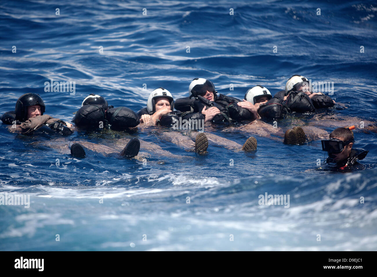US Marine Corps pilots with Marine Aircraft Group 24 float using life ...