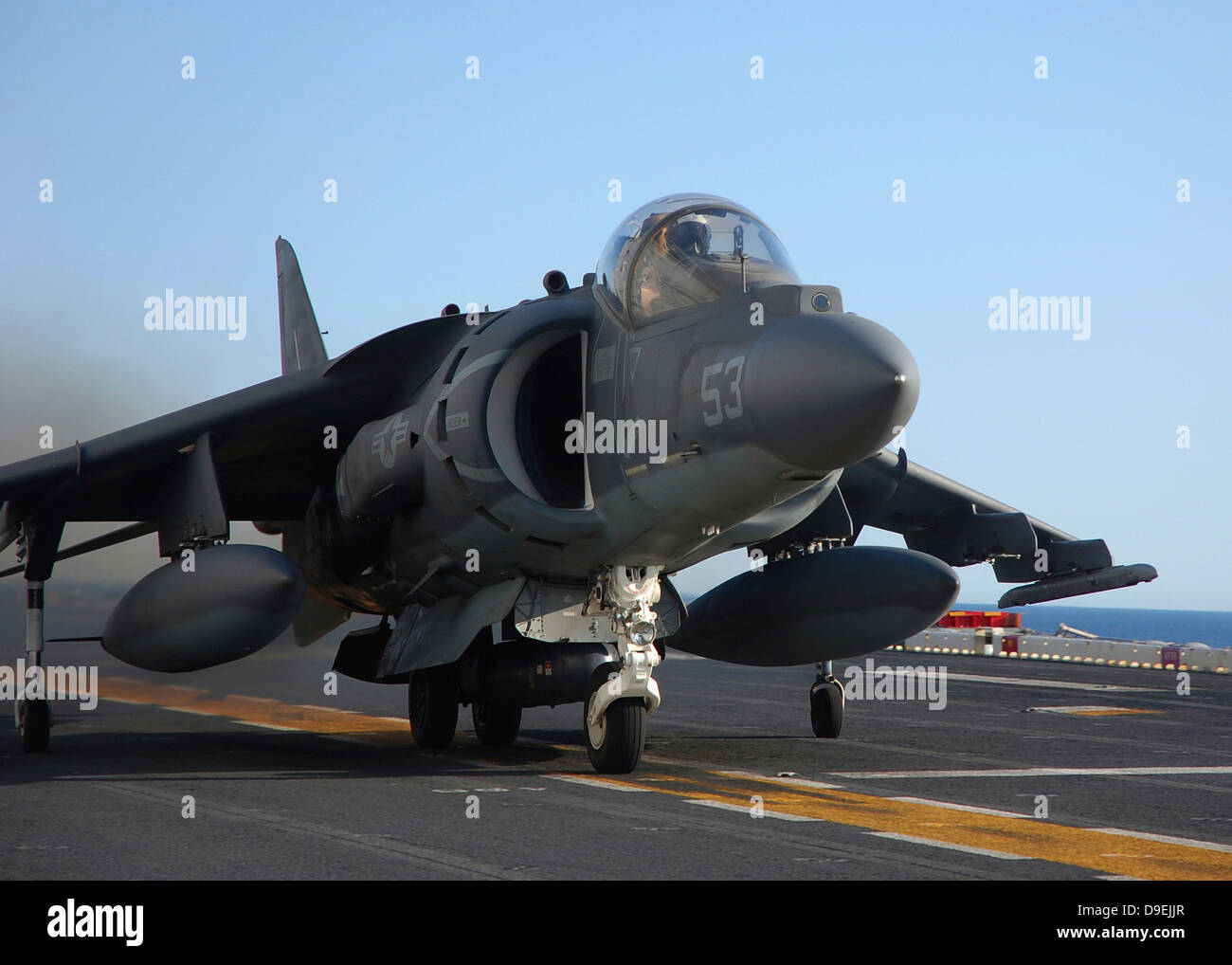 An AV-8B Harrier launches from the flight deck of USS Peleliu Stock ...