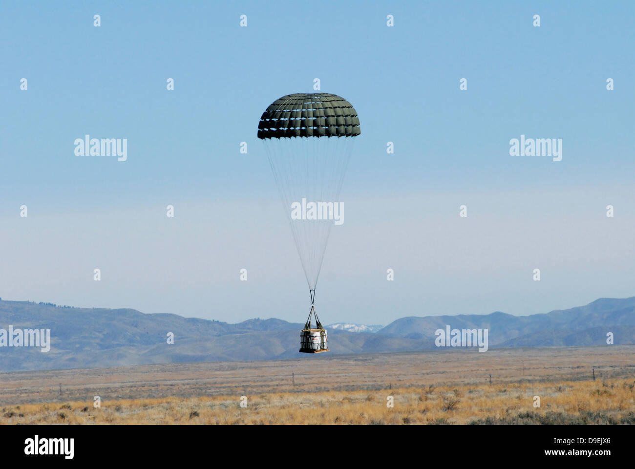 A standard Container Delivery System bundle falls to the ground Stock ...