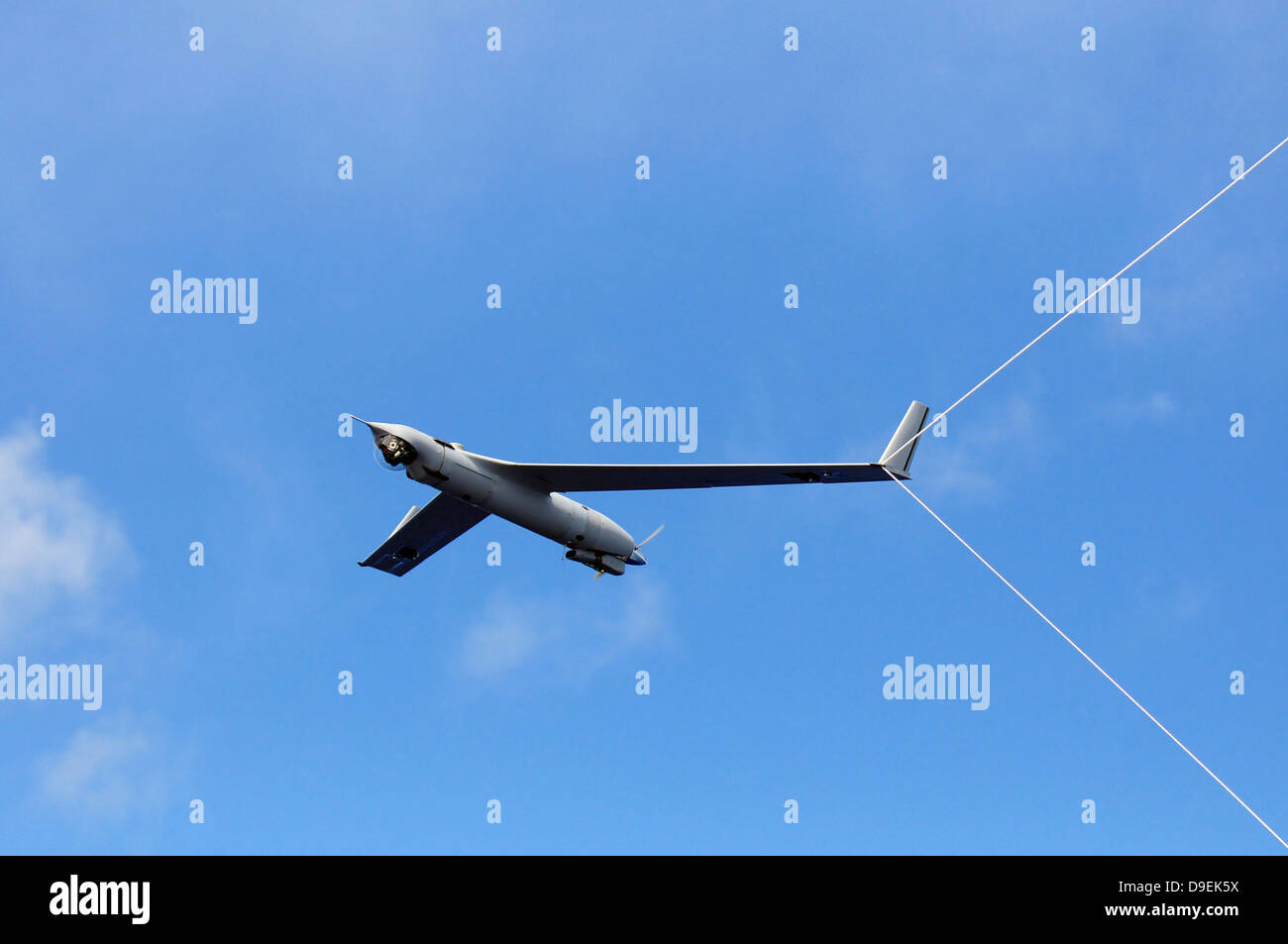 A Scan Eagle Unmanned Aerial Vehicle makes an arrested recovery on the ...