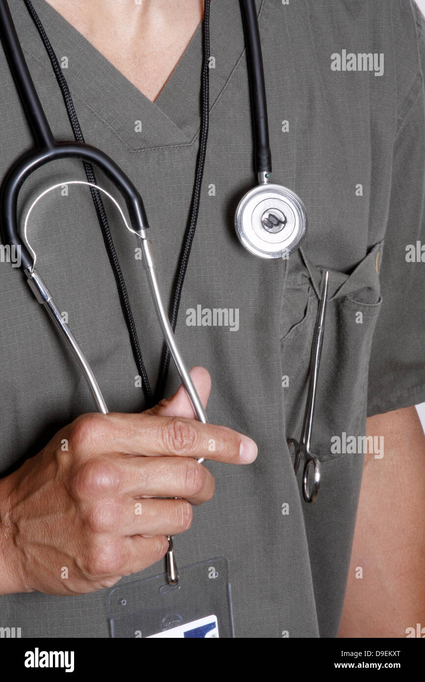 Man wearing medical scrubs stethoscope hi-res stock photography and ...