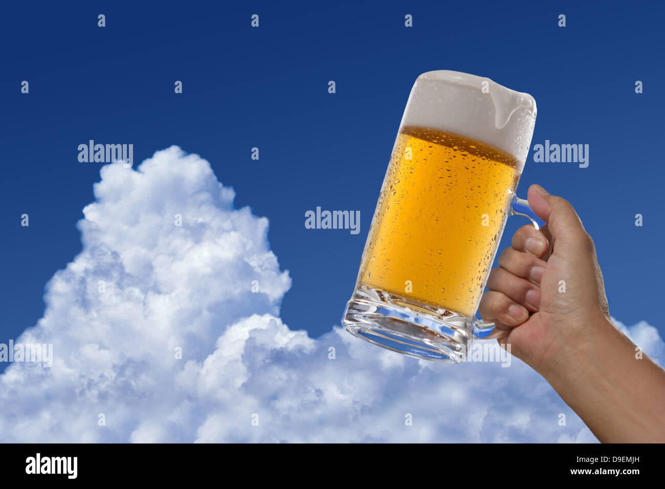 Beer and blue sky with clouds Stock Photo - Alamy